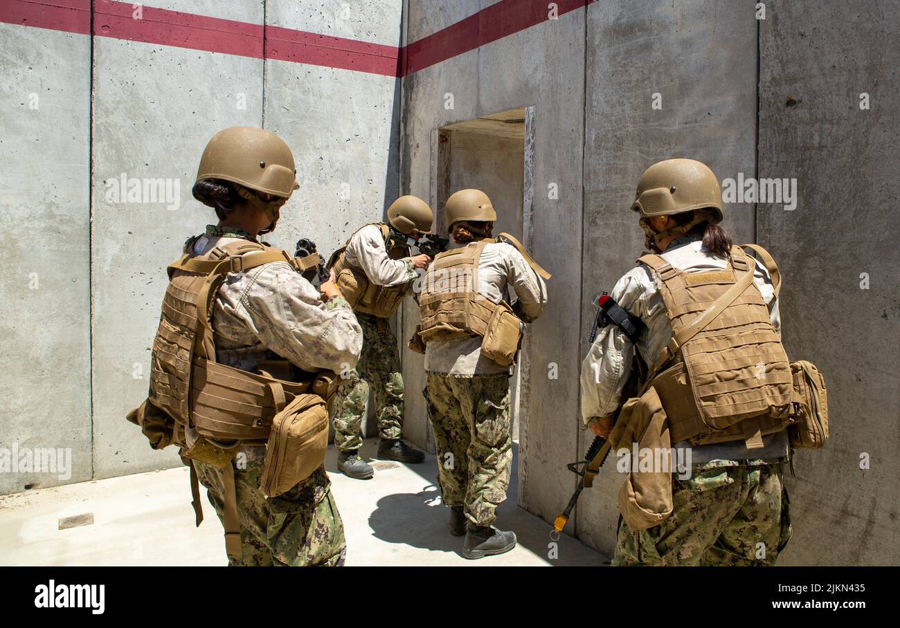 U.S. Naval Academy midshipmen conduct squad versus squad training in ...
