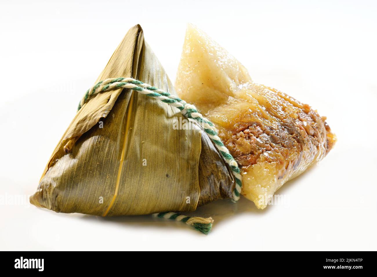 Rice dumpling wrapped in bamboo leaves hi-res stock photography and ...