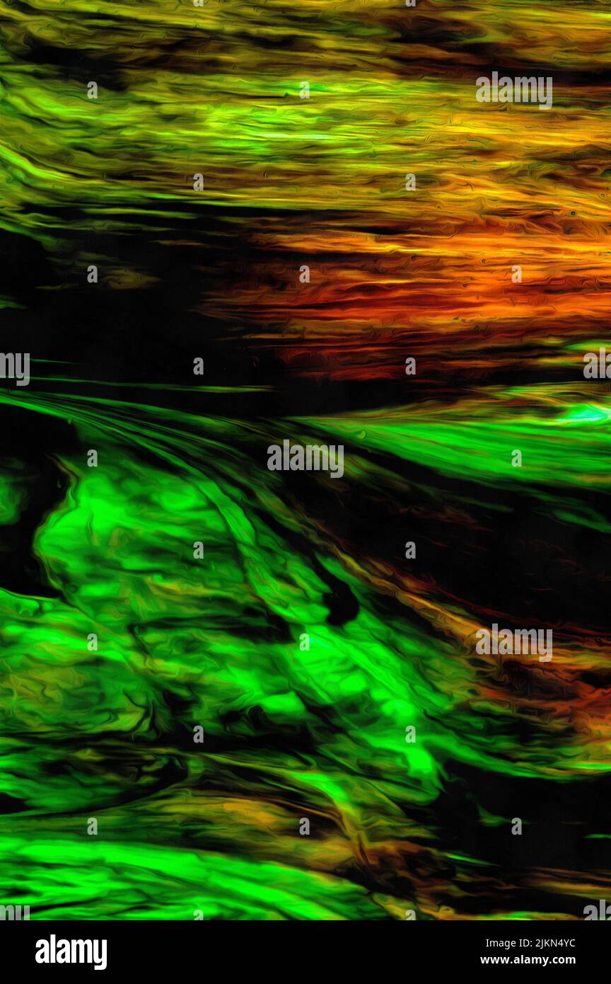 A vertical image of green and orange backlit corrugated glass- Abstract ...