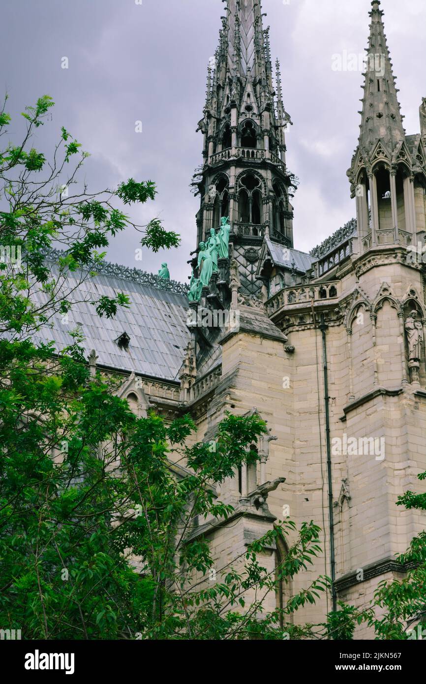 A vertical shot of the Spire of Notre Dame de Paris old historical ...