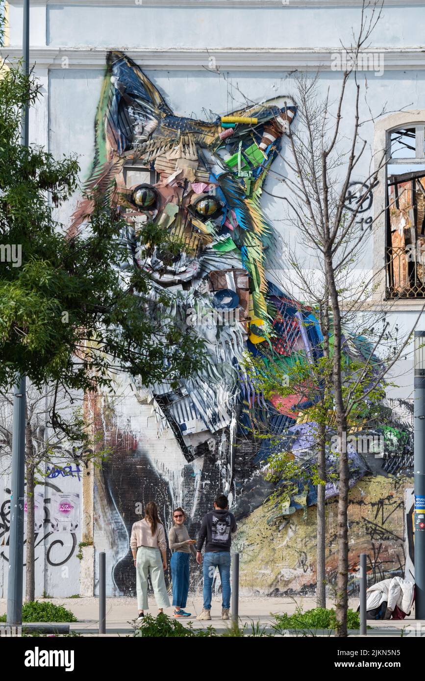 A vertical shot of an urban art mural graffiti of a fox in Lisbon ...