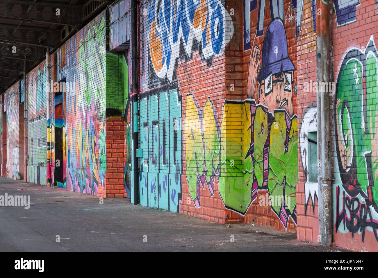 Urban art walls with graffiti of old buildings in the city of Lisbon ...