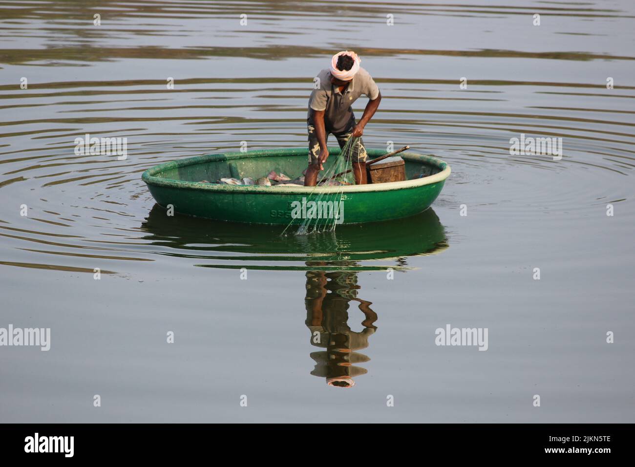 One man fishing boat hi-res stock photography and images - Alamy