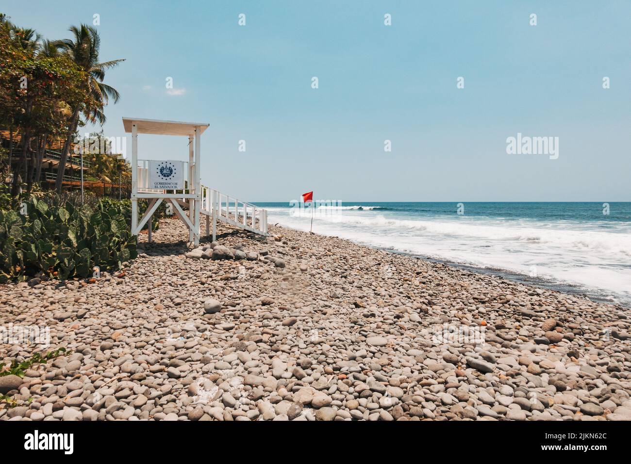 the rocky shores of El Tunco beach on the Pacific Coast of El Salvador ...