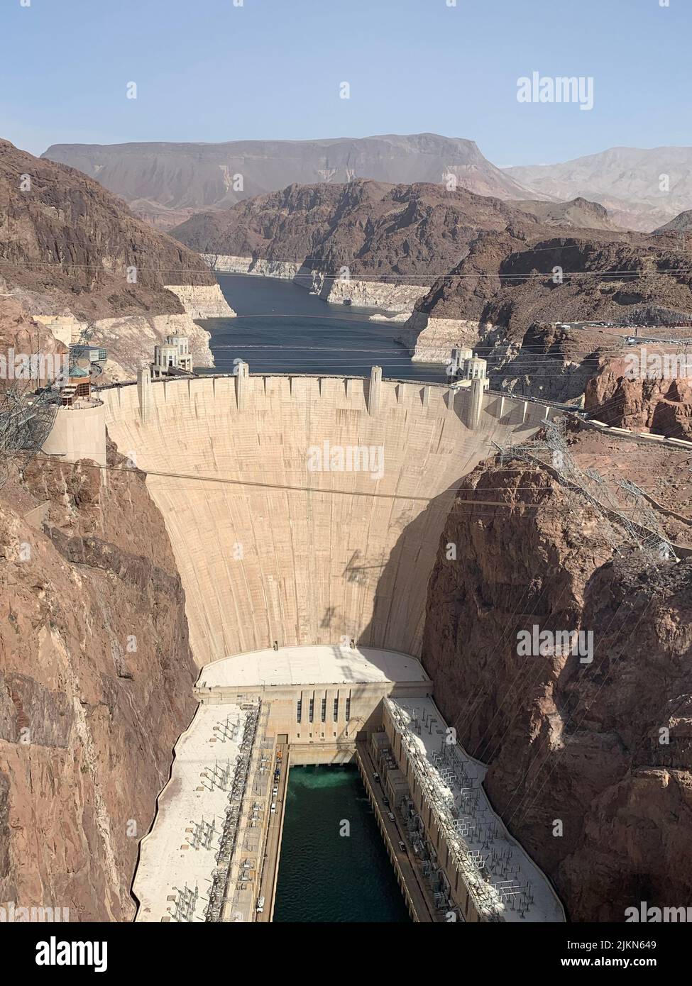 A vertical shot of Hoover Dam and surrounding canyon landscape at the ...