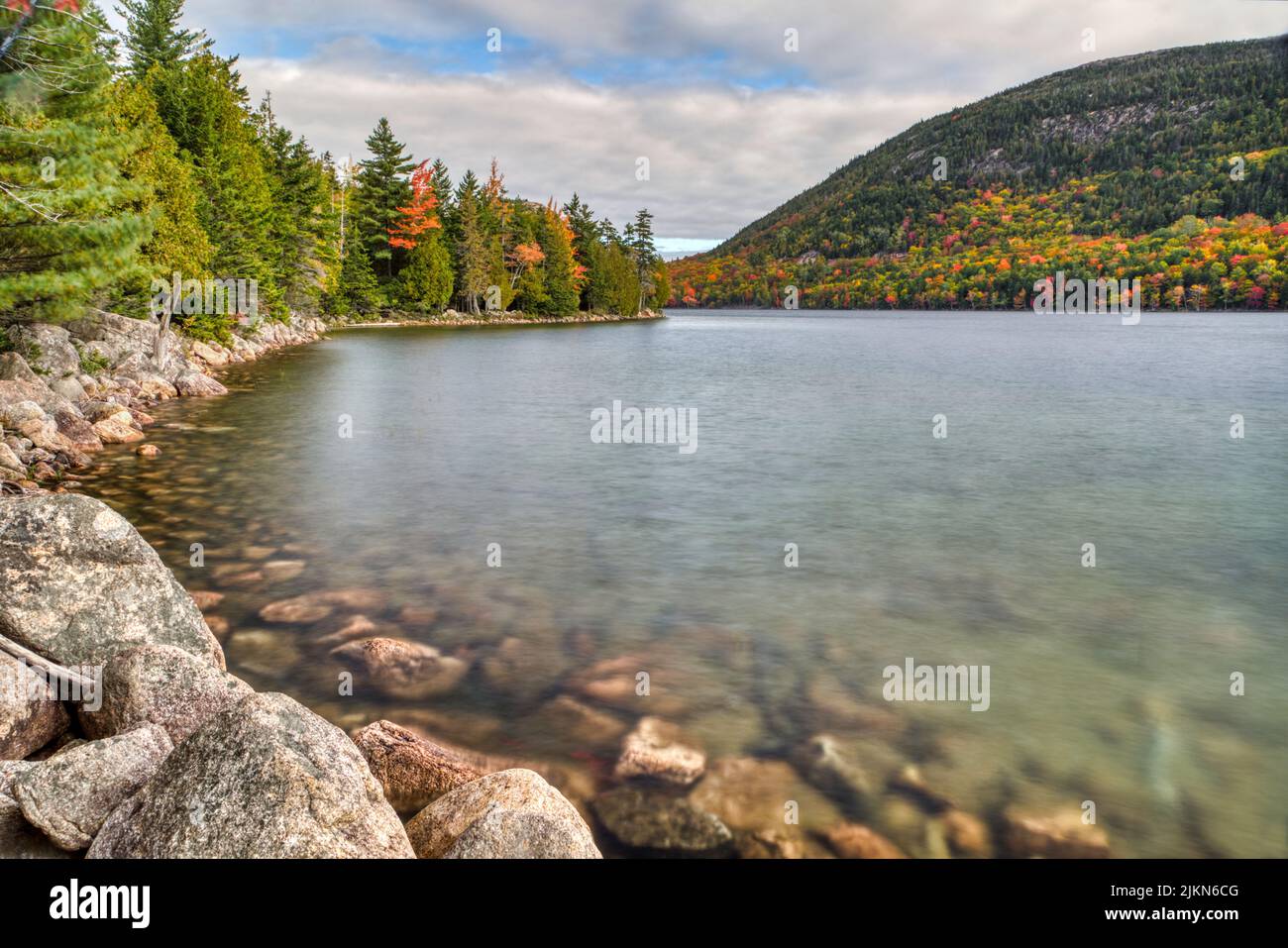 A picturesque view of Jordan Lake in autumn in Acadia National Park ...
