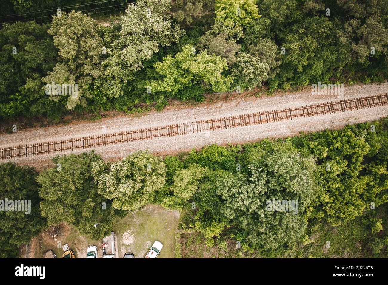 A top view of a train track in a forest Stock Photo - Alamy