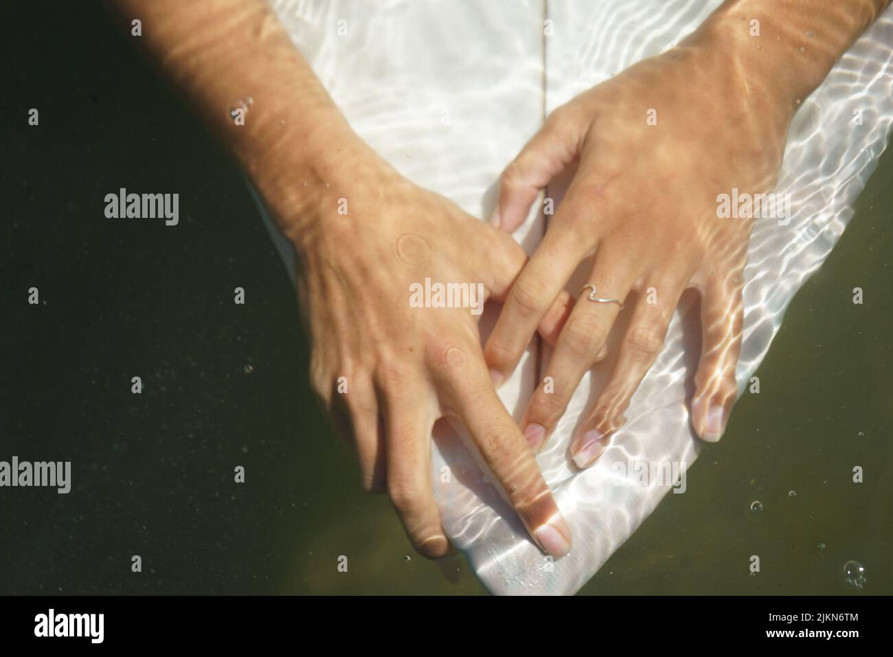 Underwater hands hi-res stock photography and images - Alamy