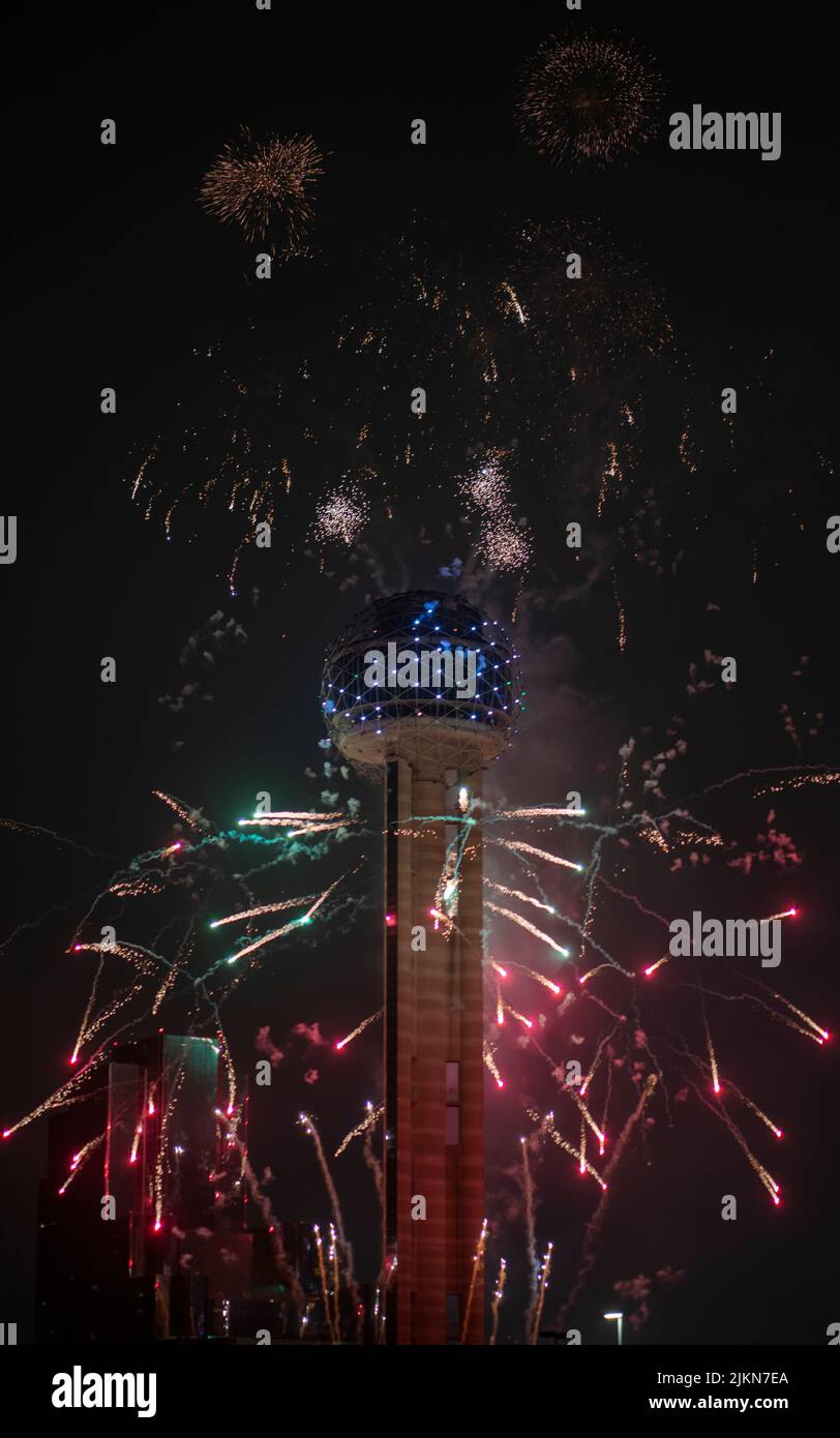 A beautiful Shot of a celebration of New years eve at reunion tower ...