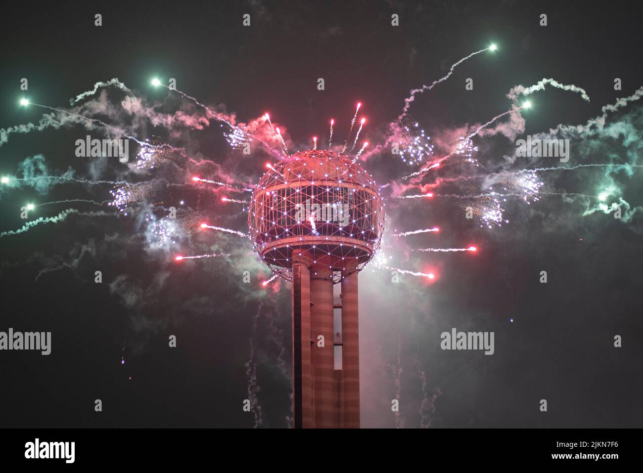 The colorful fireworks exploding above the Reunion Tower in Dallas ...