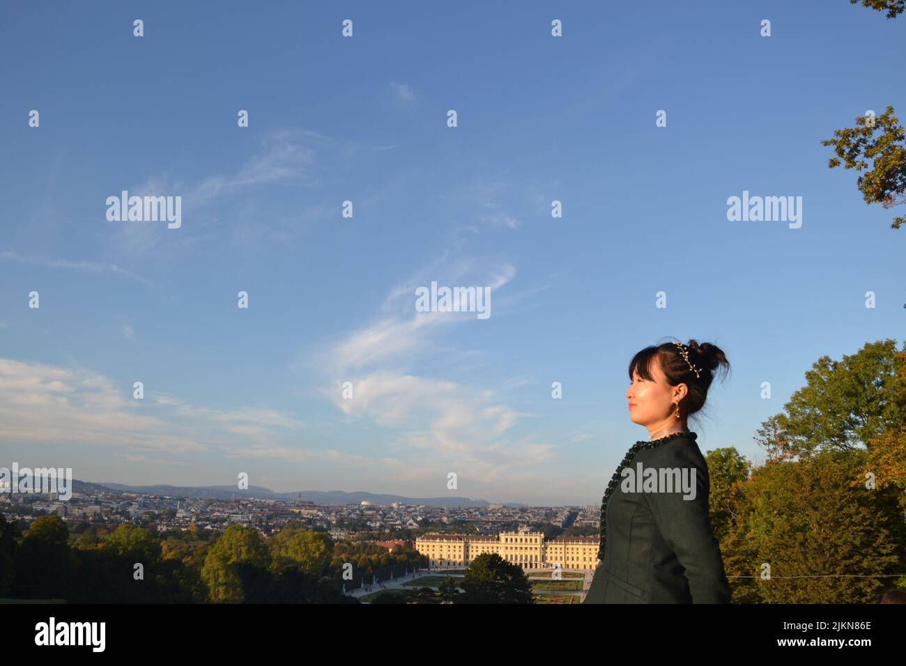 An Asian girl admiring Schloss Schonbrunn on a sunny weather , Vienna ...