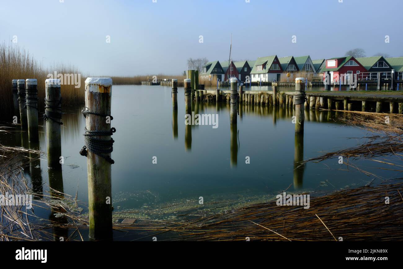 Small fishing and tourist harbour with boathouses in the inland harbour ...