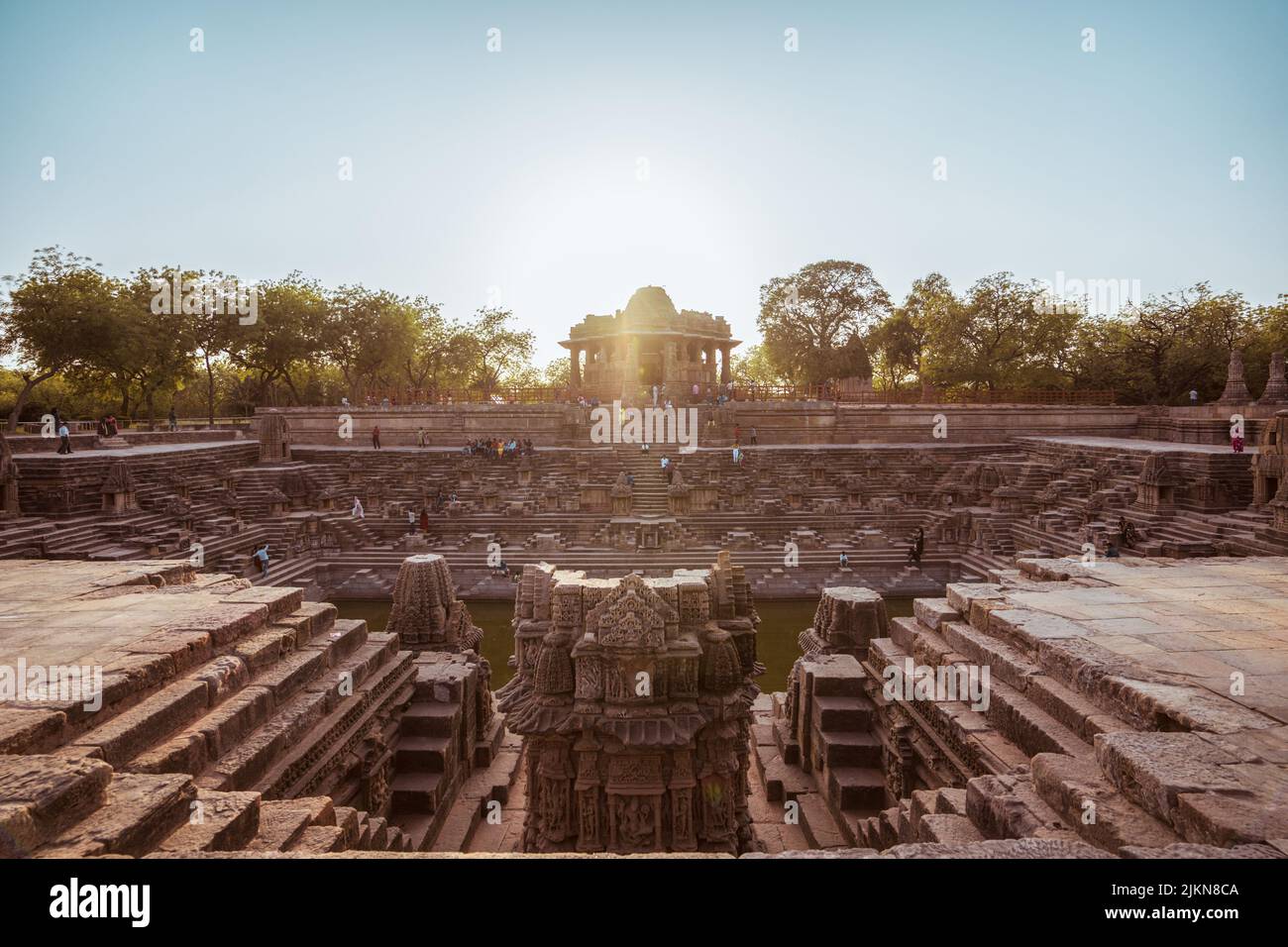 A scenic view of the Sun Temple at the Modhera village at sunset ...