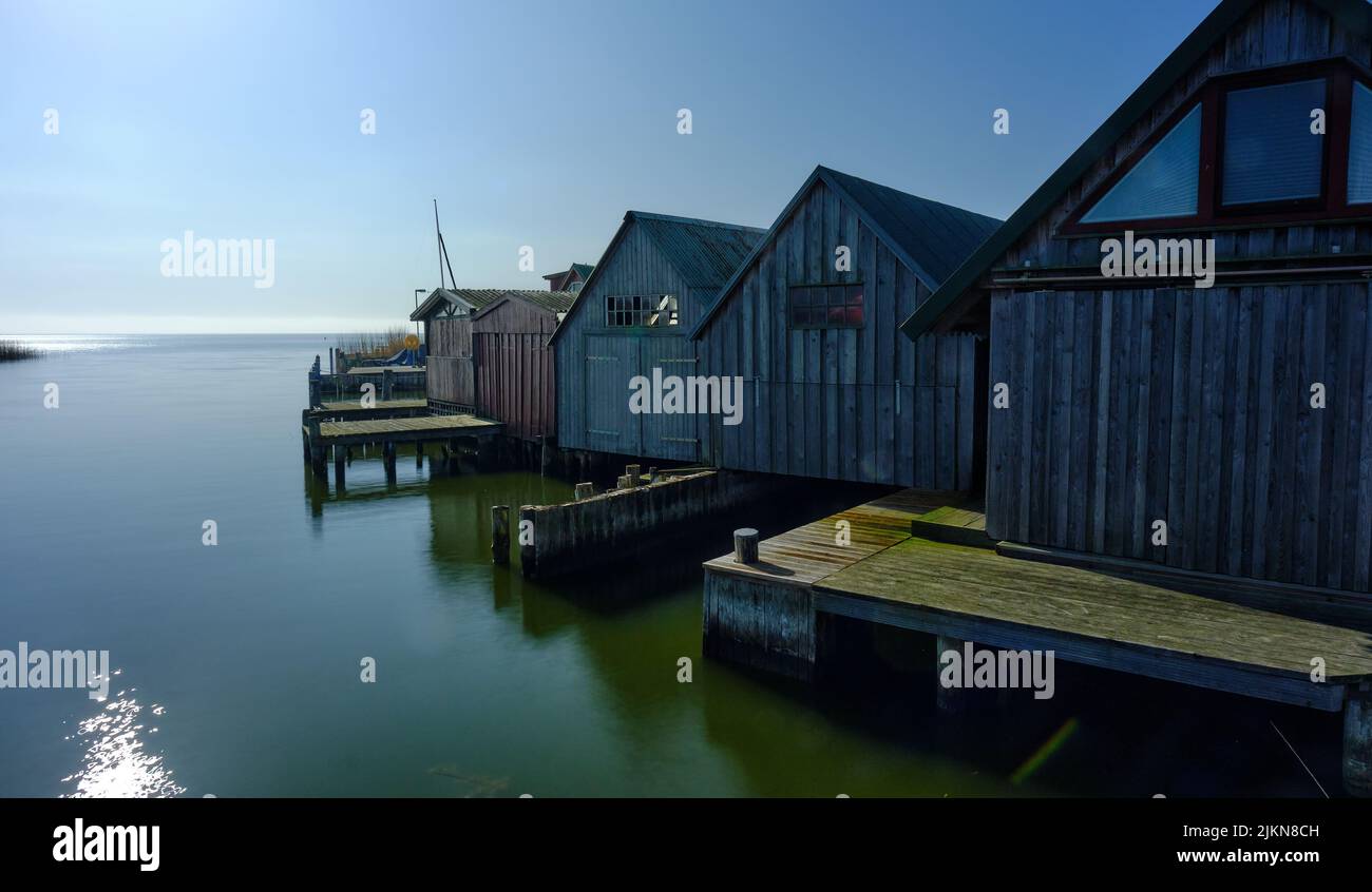 Small fishing and tourist harbour with boathouses in the inland harbour ...