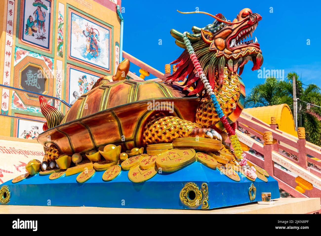 A colorful dragon statue in a park under the bright sunlight Stock ...