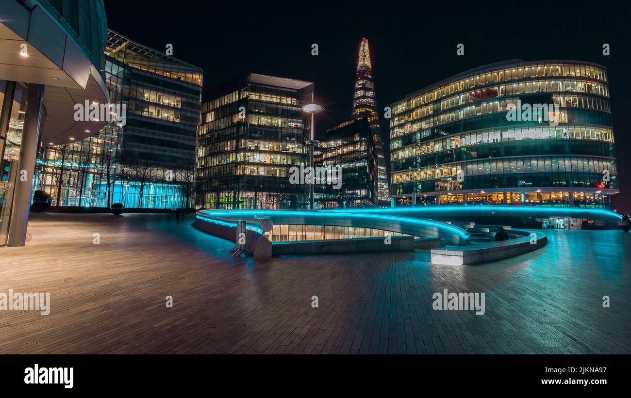 A scenic night view of modern buildings in London, Great Britain Stock ...
