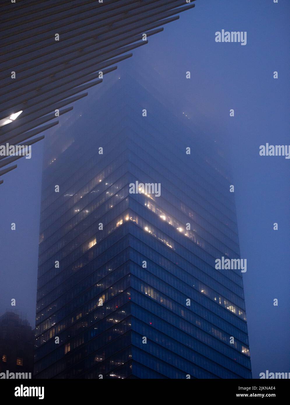 Modern skyscraper in fog hi-res stock photography and images - Alamy