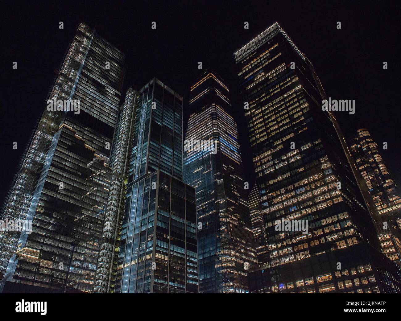 A vertical shot of the skyline and lights on buildings at night Stock ...