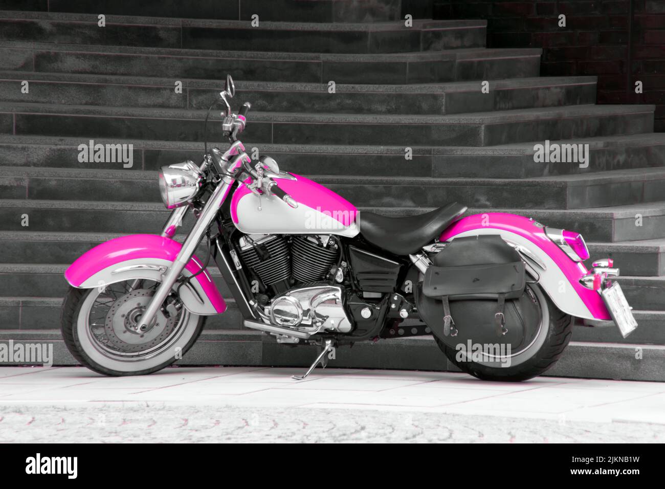 A pink motorcycle parked outdoors Stock Photo - Alamy