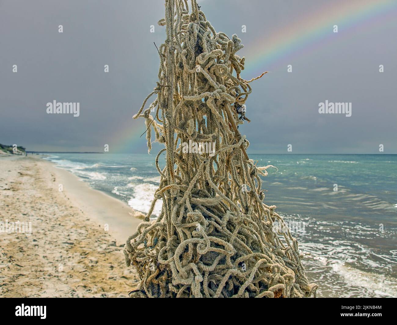 The Tangled net on the beach on the rainbow background Stock Photo - Alamy
