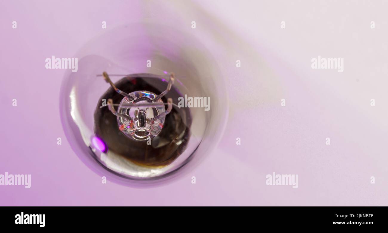 A top view of a light bulb on a white surface Stock Photo - Alamy
