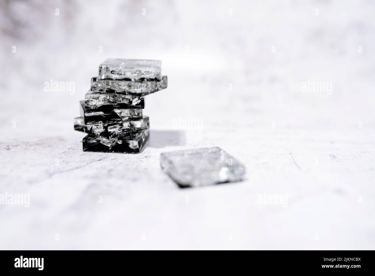 A stack of crystal stones on a white surface and background Stock Photo ...