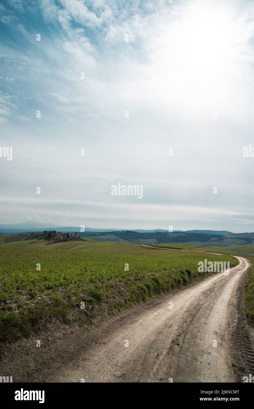 Beautiful shot road fields hi-res stock photography and images - Alamy