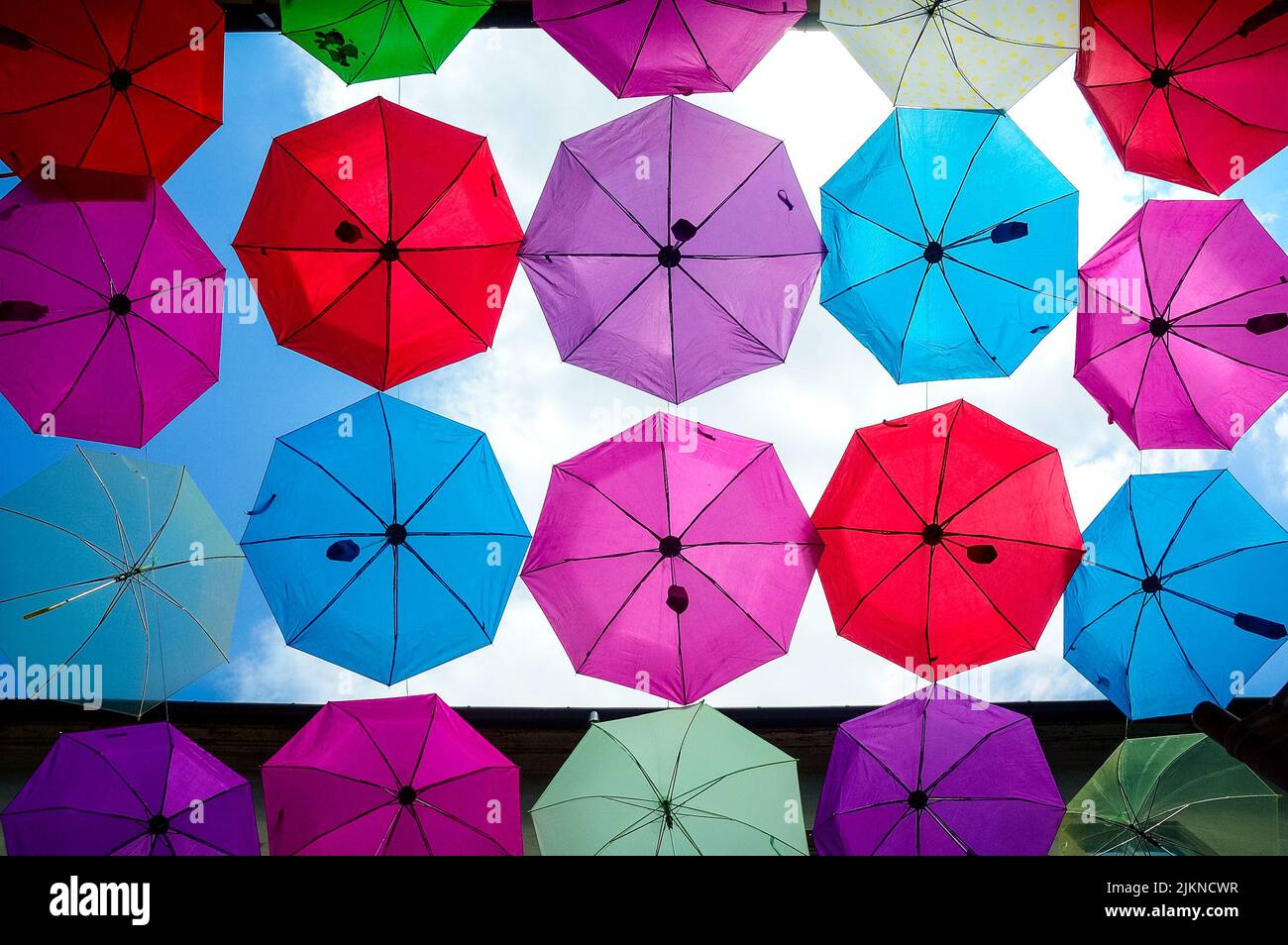 Open umbrellas hanging overhead hi-res stock photography and images - Alamy