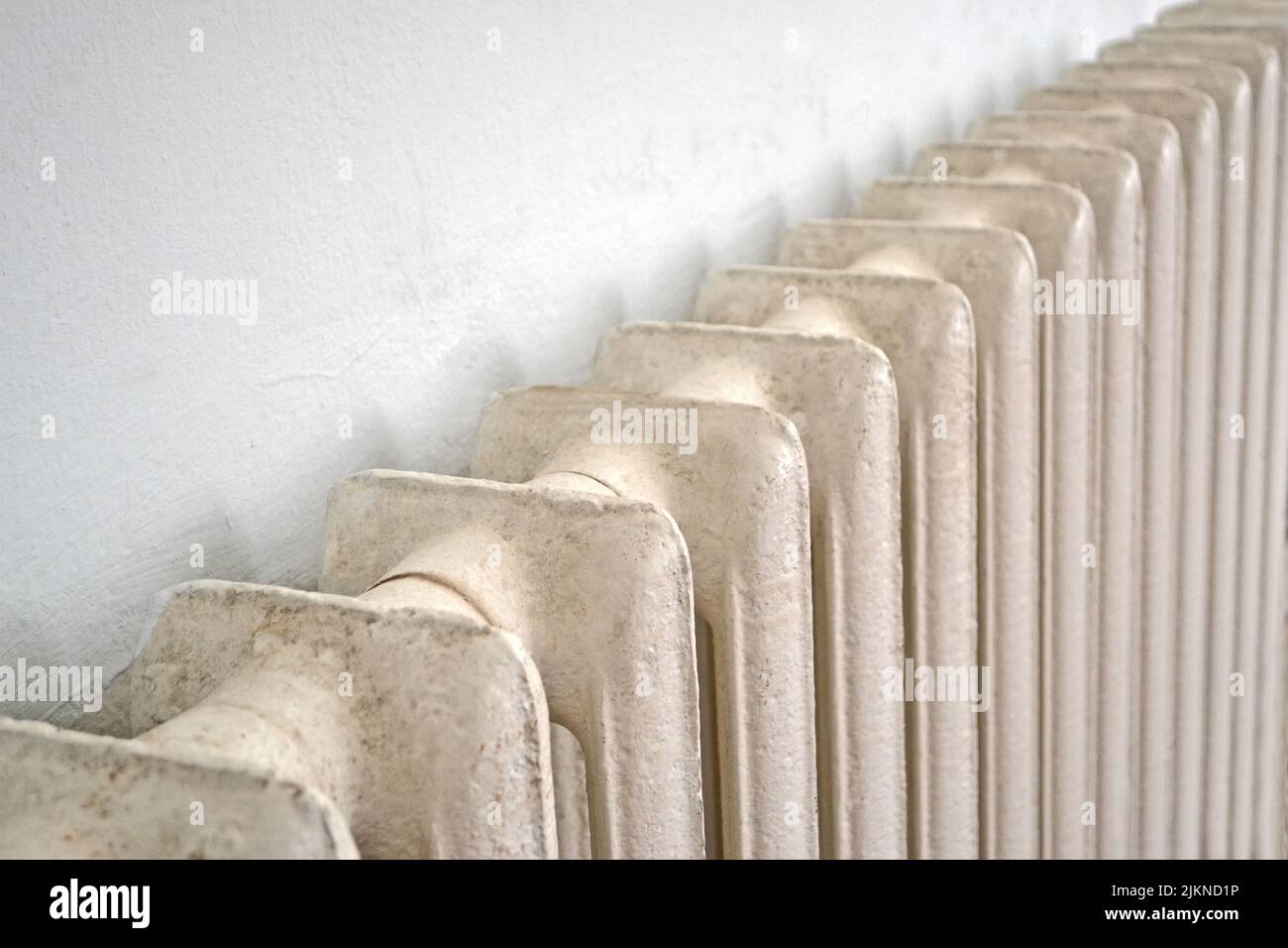 vintage white massive central heating radiator (battery), industry ...