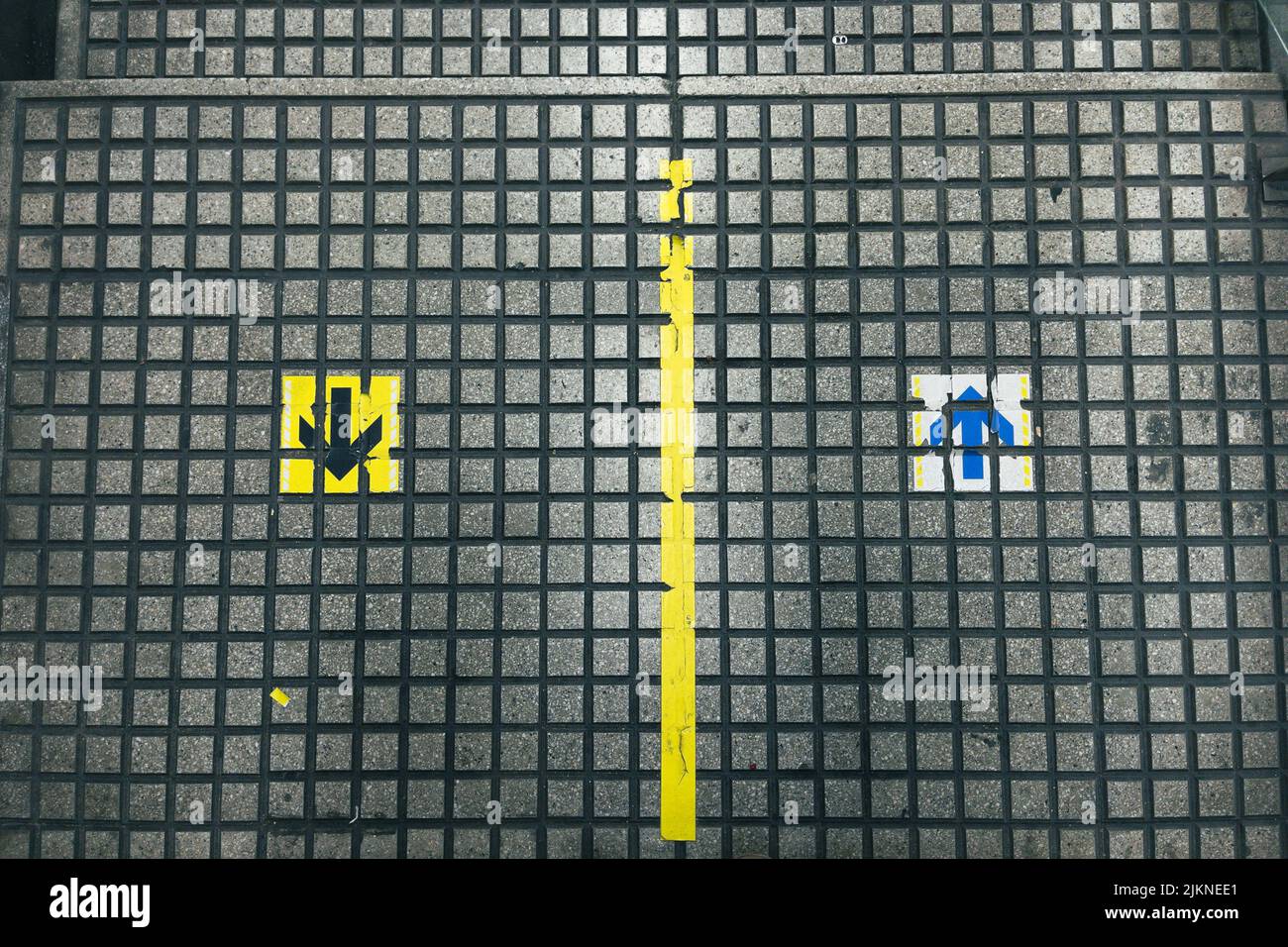 A photo of a pavement with small arrows Stock Photo - Alamy
