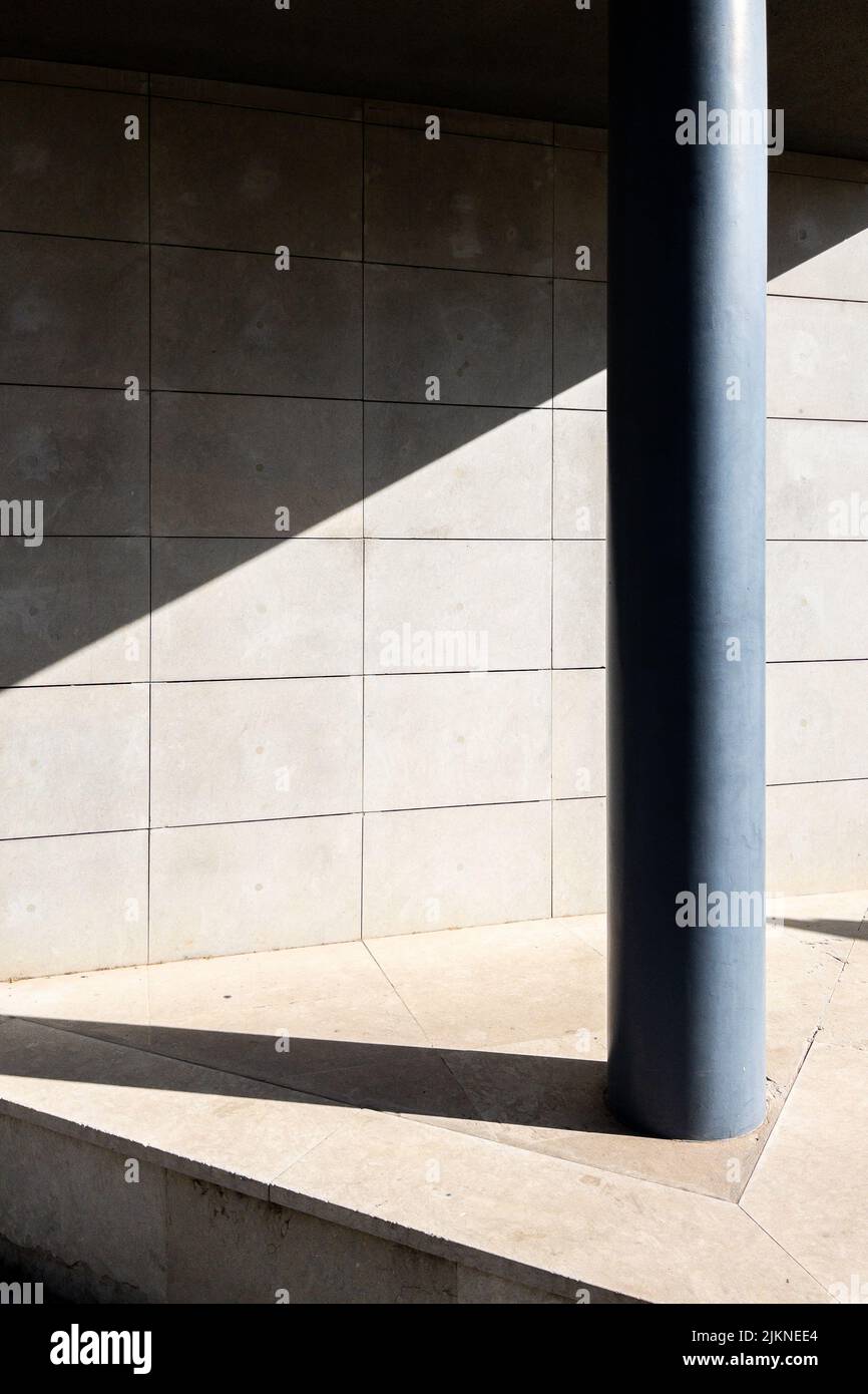 A vertical shot of architecture details of modern concrete wall of a ...