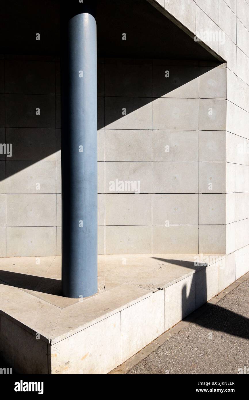 A vertical shot of architecture details of modern concrete wall of a ...