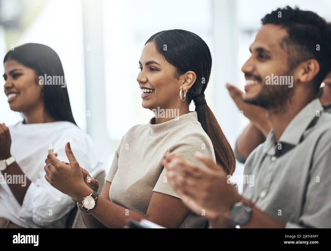 This is what a healthy work environment looks like. a group of people ...