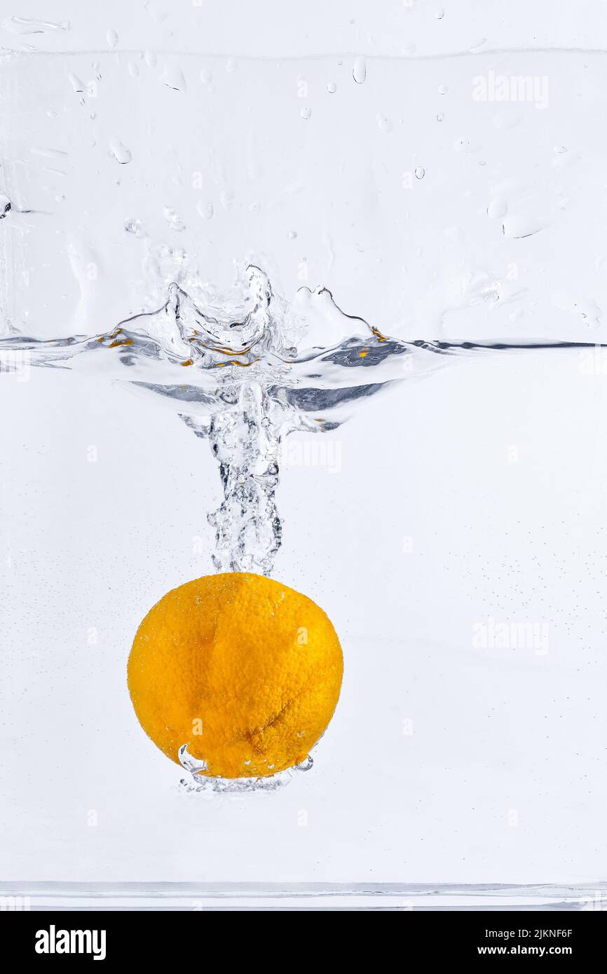Lemon water splash, isolated on a white background Stock Photo - Alamy