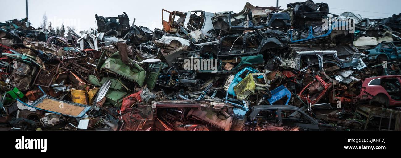 A car dump with colorful separated parts Stock Photo - Alamy