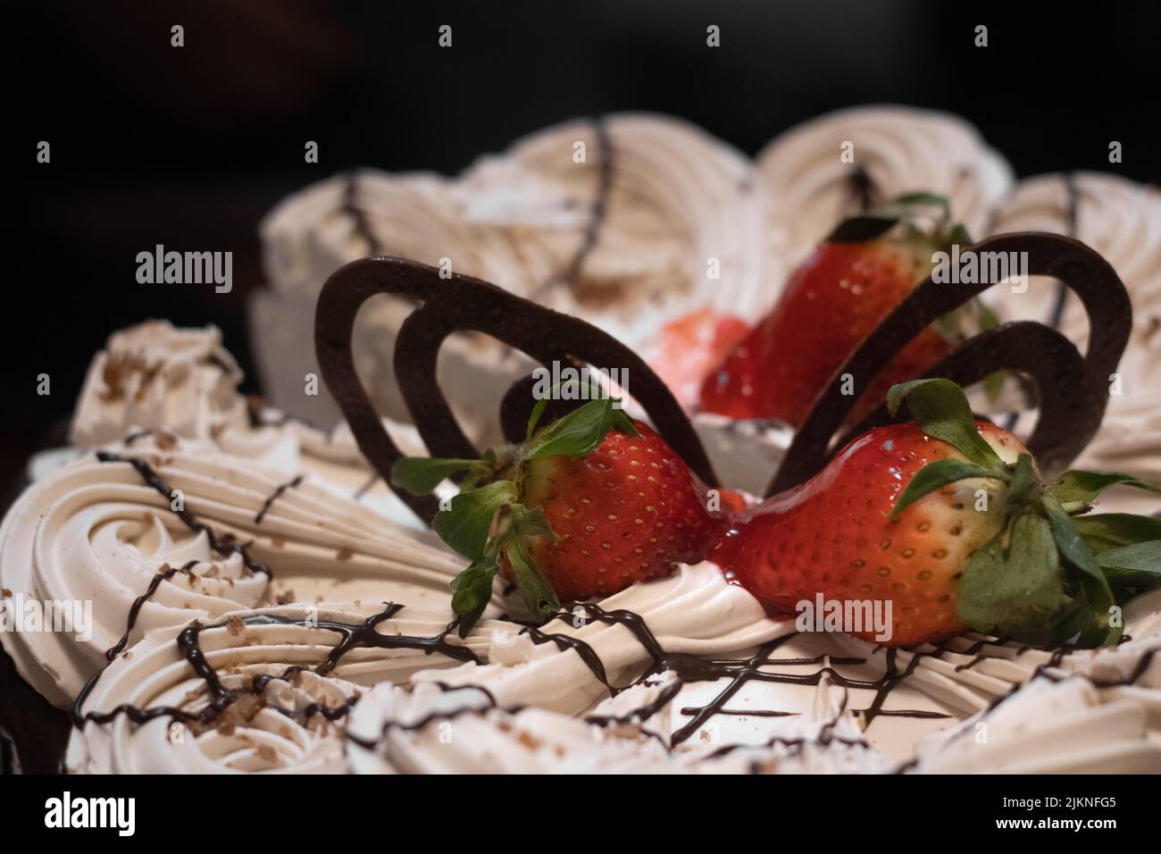 A three milk layer cake with strawberry and chocolate Stock Photo - Alamy