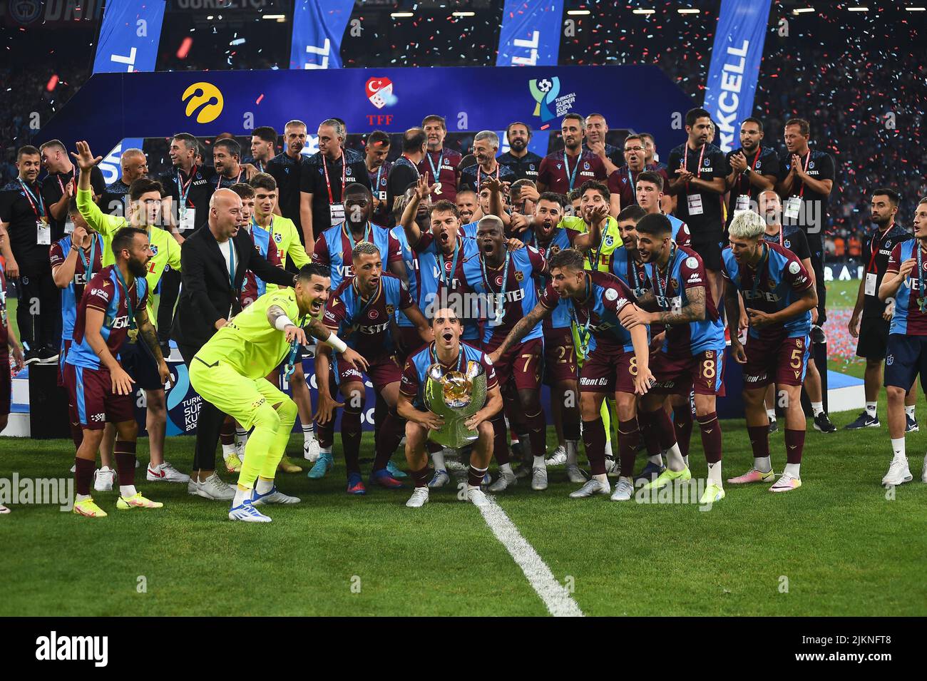 Trabzonspor players poses with their trophy after the Turkish Super Cup ...