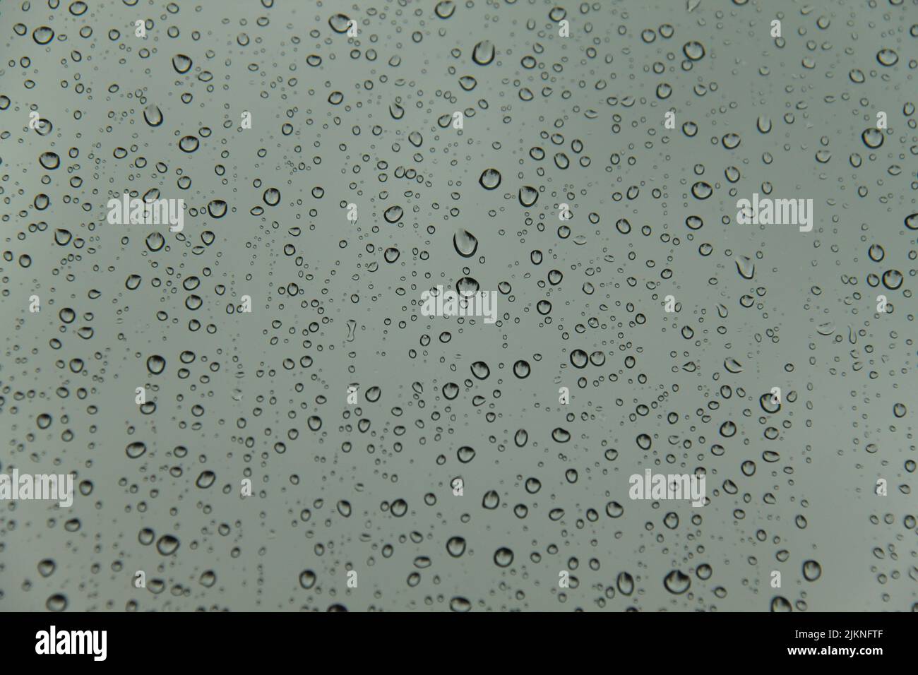 A closeup of water drops on a window. Great for backgrounds and ...
