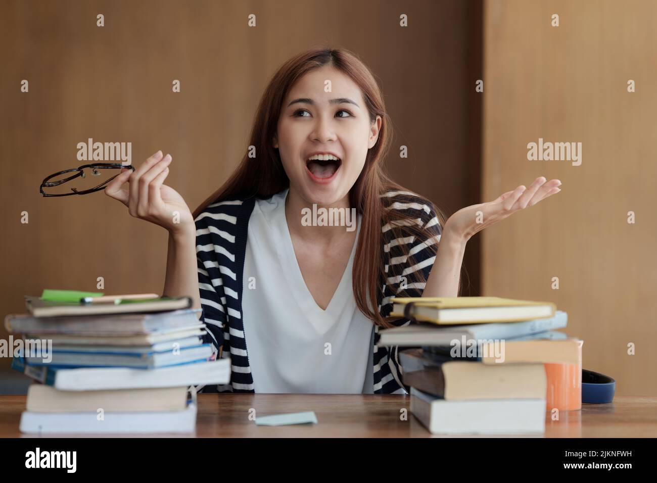 Back to school concept. Young woman excited while meeting friend Stock ...