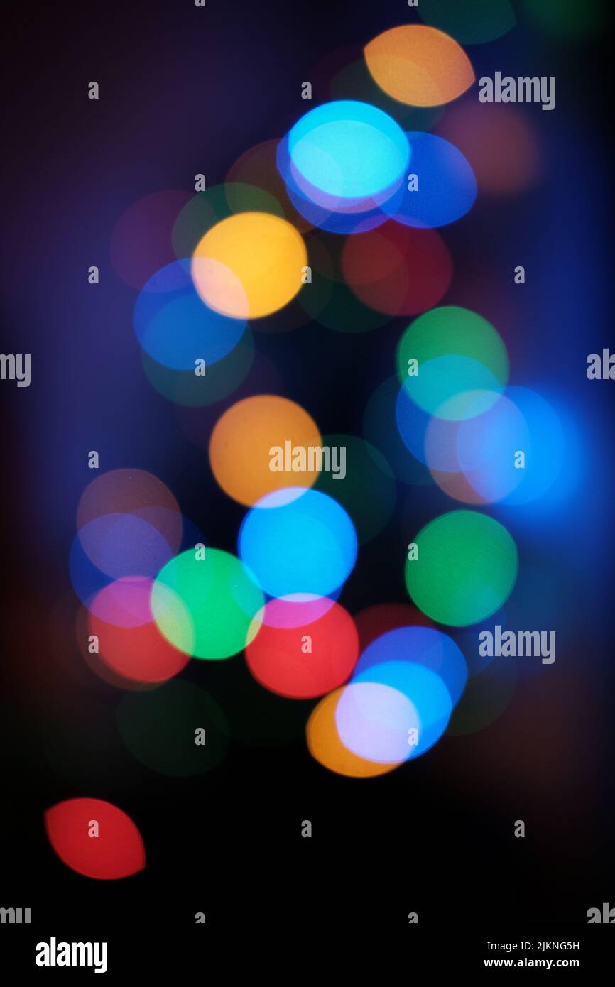 Abstract colorful glowing bokeh lights at night Stock Photo - Alamy