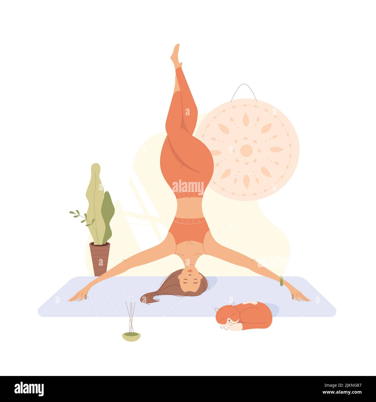 A woman practices yoga headstand balance at home next to a sleeping cat ...