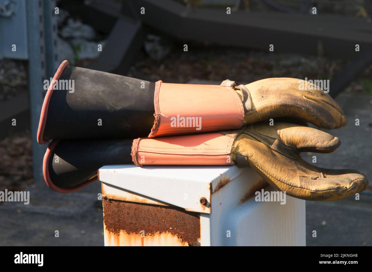 A Pair Of Insulated Gloves Stands Ready To Wear To Prevent Electric
