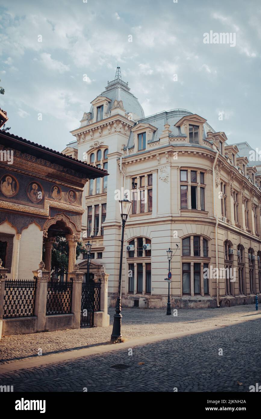 An old architecture under a bright cloudy sky Stock Photo - Alamy