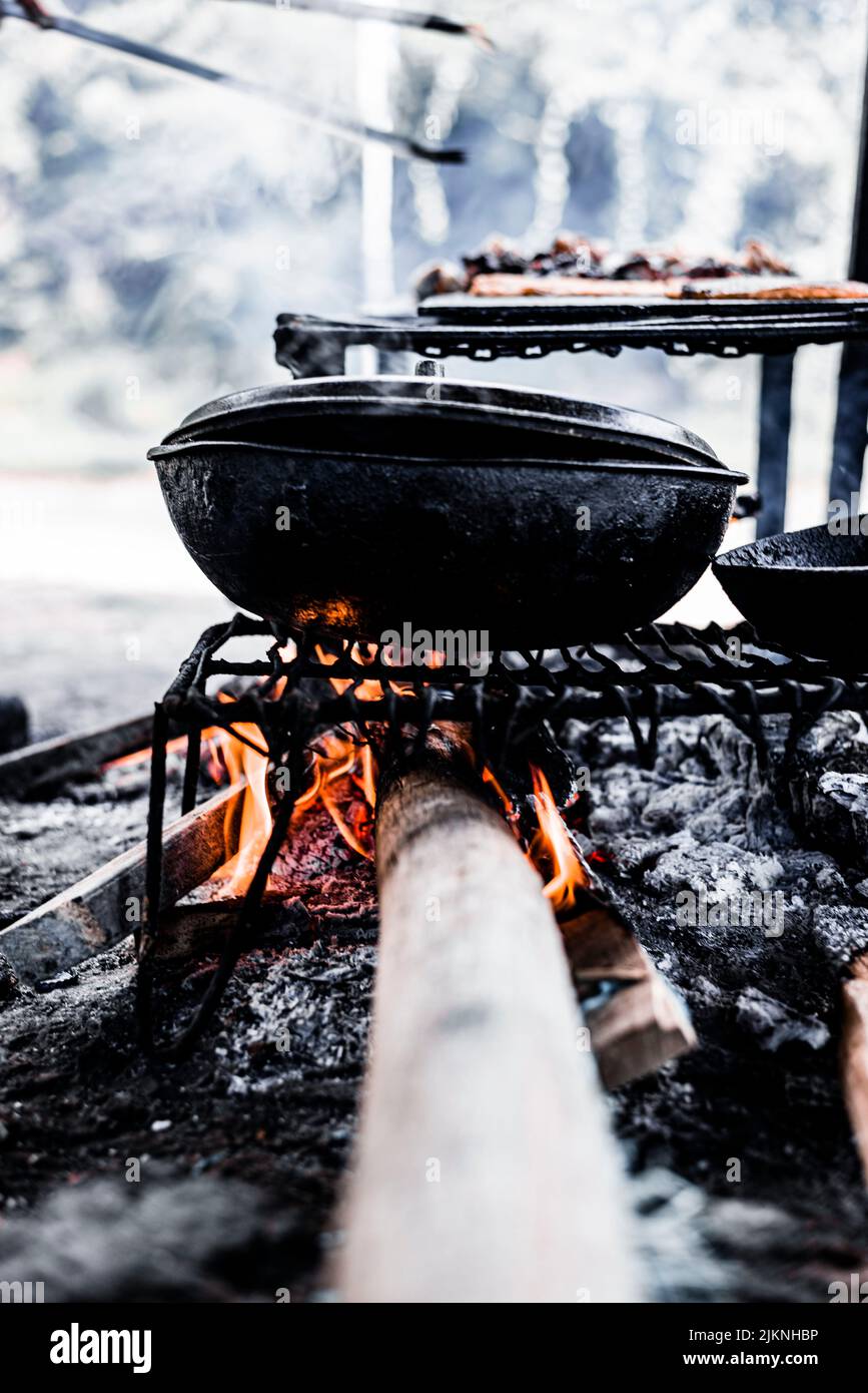 A vertical closeup of the cauldron on the fire. Cooking outdoors Stock ...
