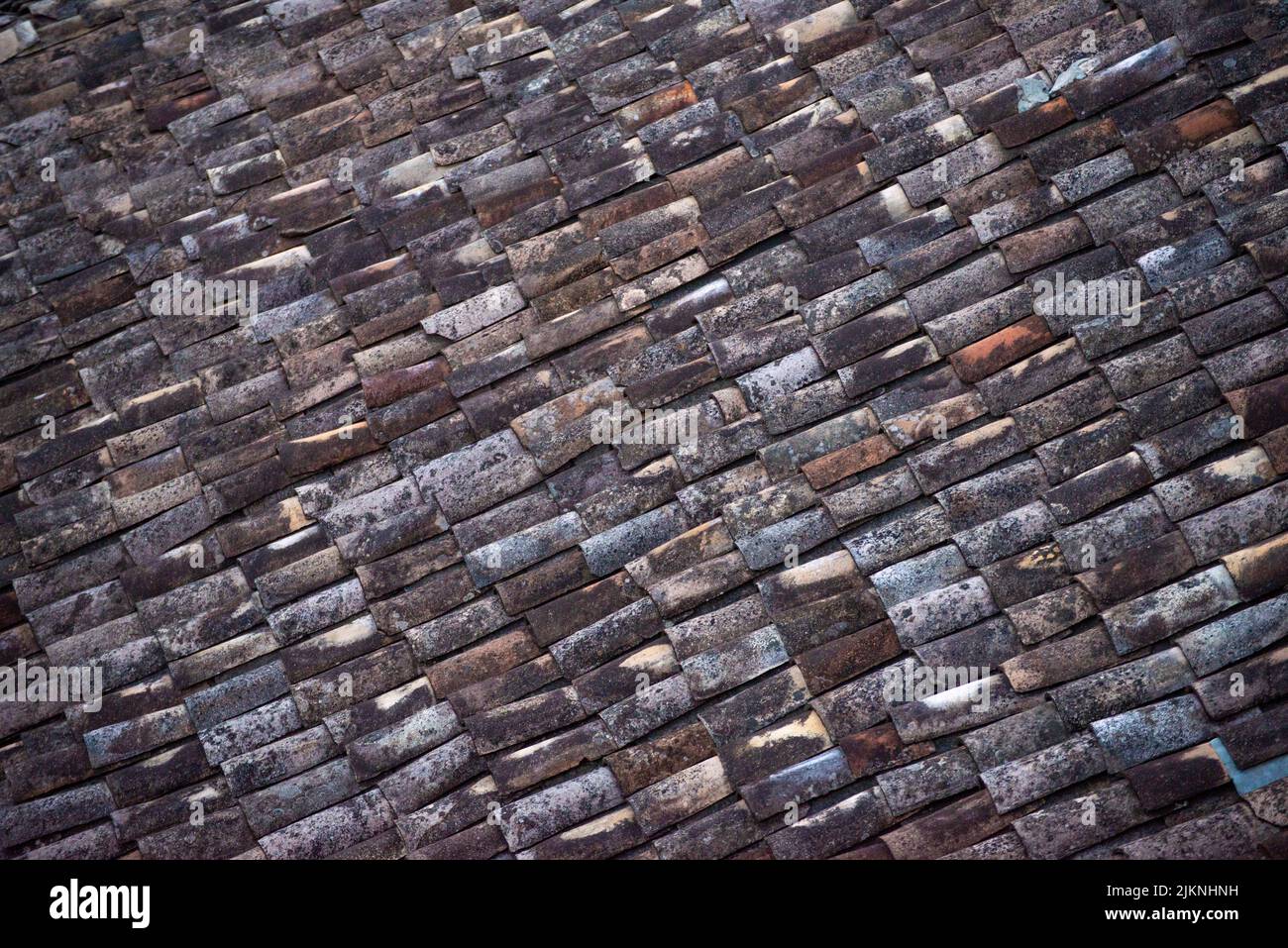 A texture of a tiled roof with weathered surface Stock Photo - Alamy