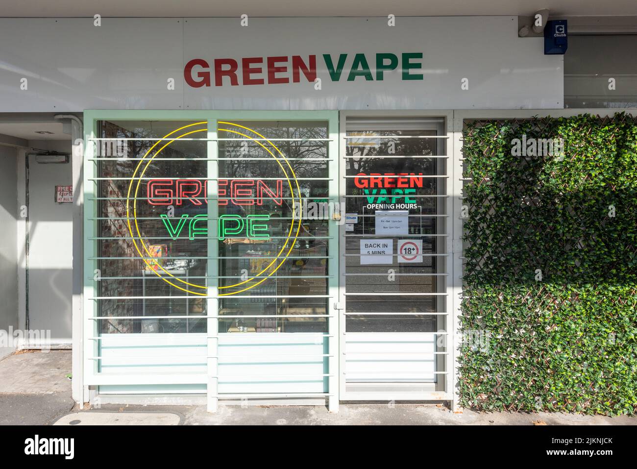 Vape shop front protected from ram raiding by steel bars. Green Vape ...