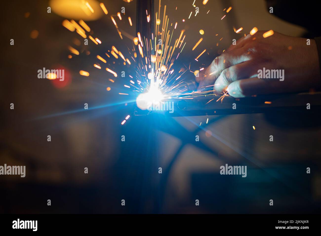 Welding work. High temperature. Hot steel. Metal welding. Production ...