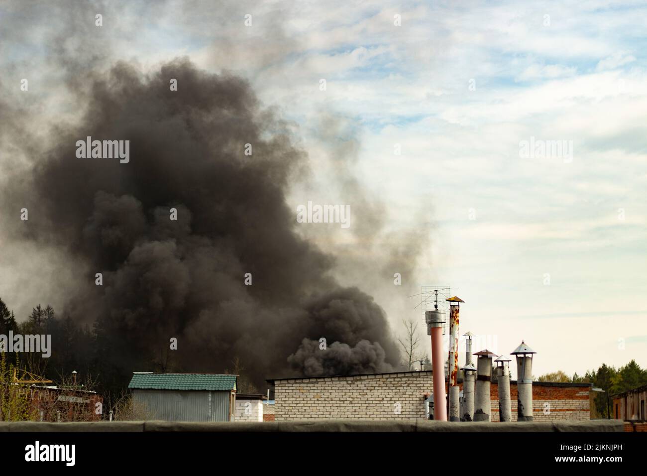 Fire in street. Smoke and fire. Landfill is burning. Environmental hazards. Air pollution Stock ...