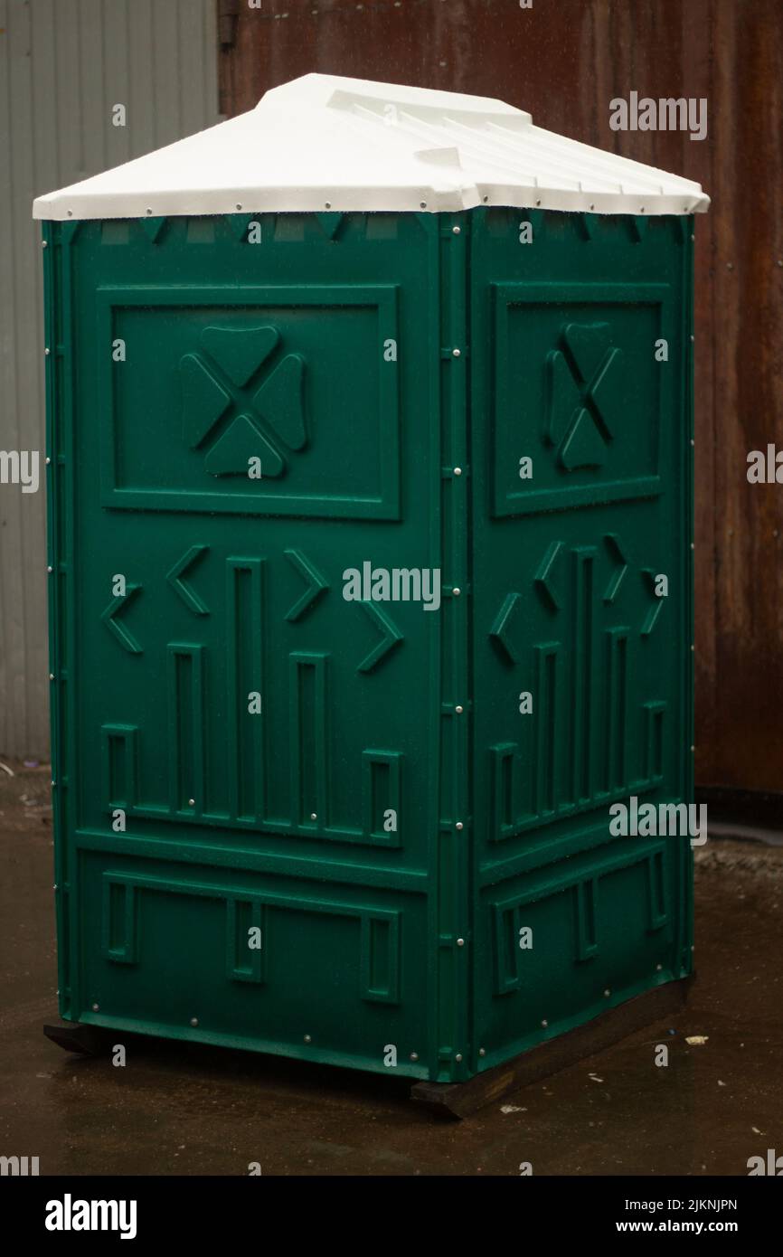 Outdoor toilet. Plastic toilet. Place for waste. Country sorter Stock ...