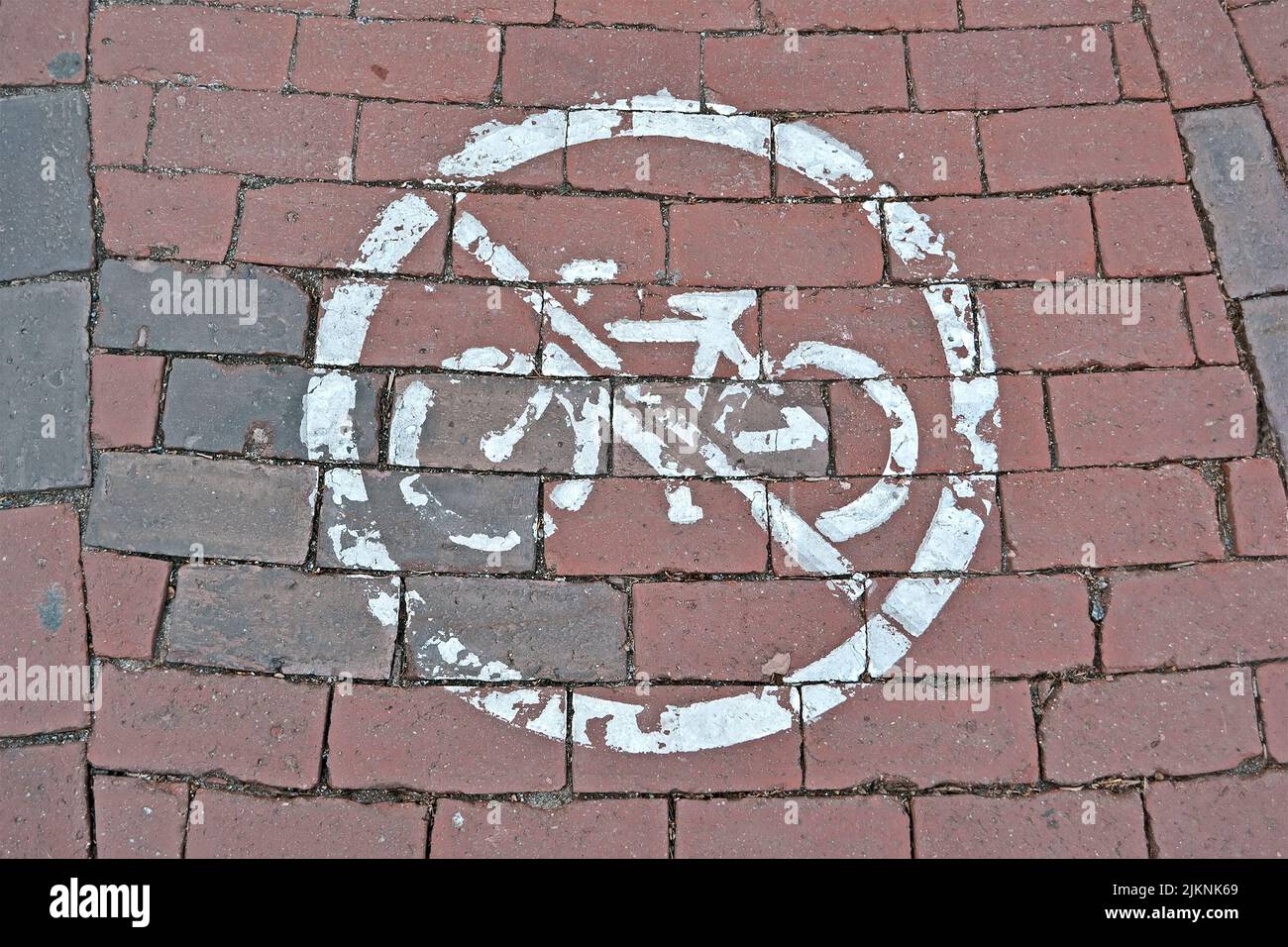 no bike sign on red brick closeup, modern travel security diversity ...